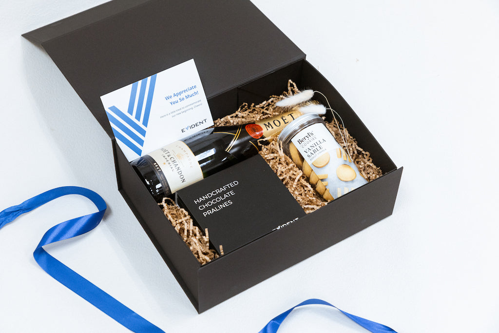 A luxurious opening ceremony gift box featuring a branded gift tag ...